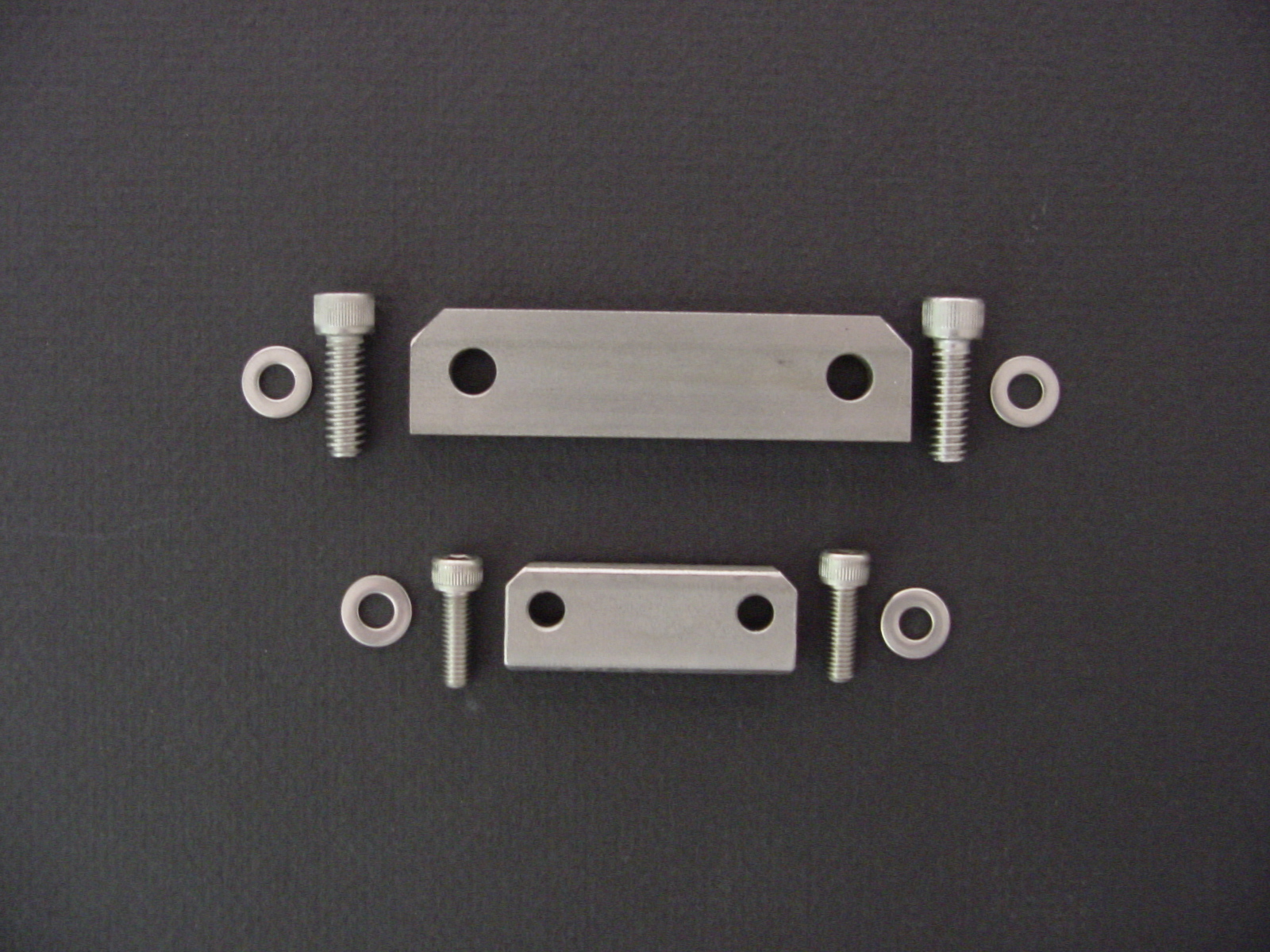 Load Pin Keeper Plates On Strainsert Co.